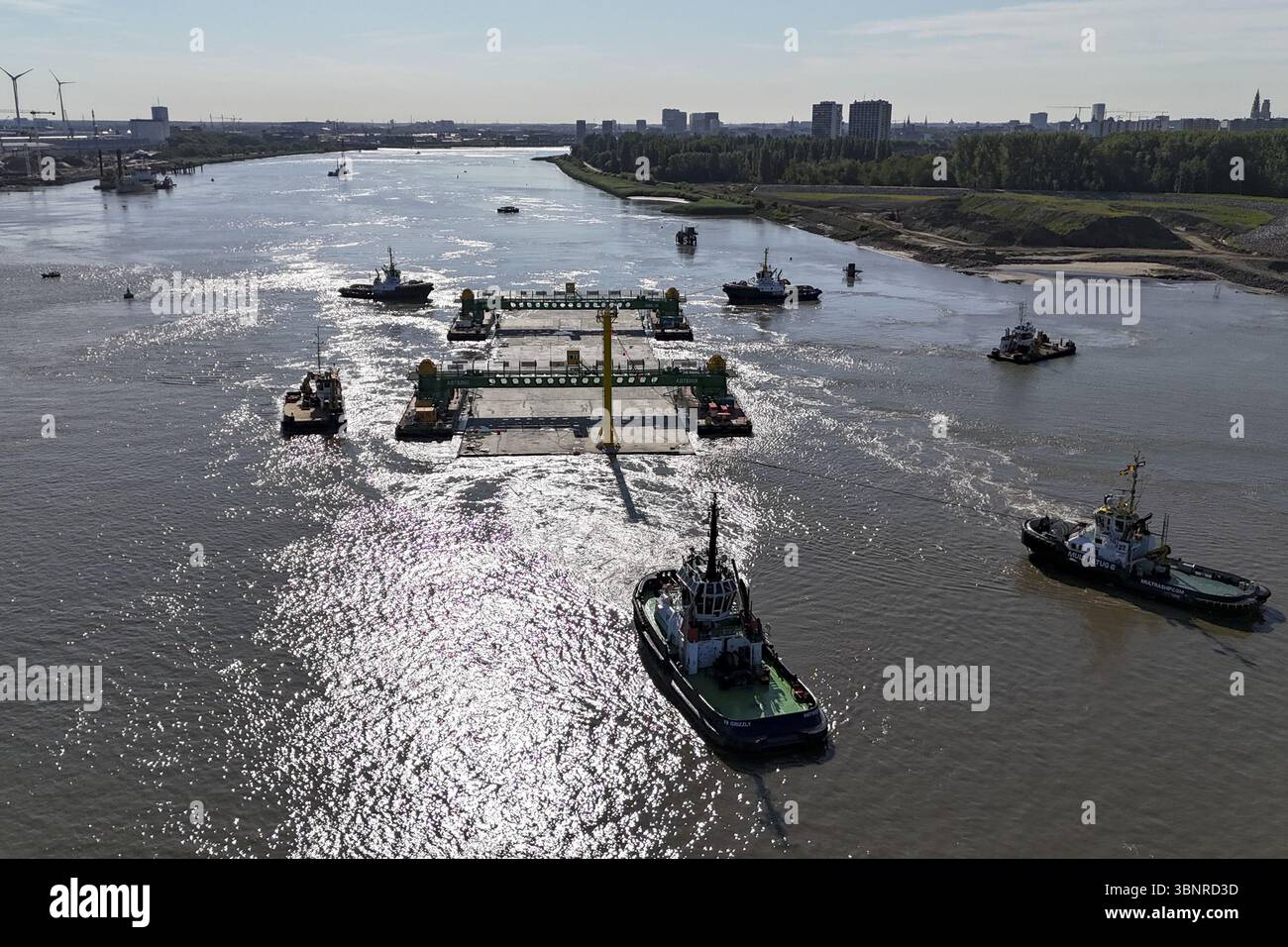 This aerial drone image shows the sinking of the first of eight tunnel ...