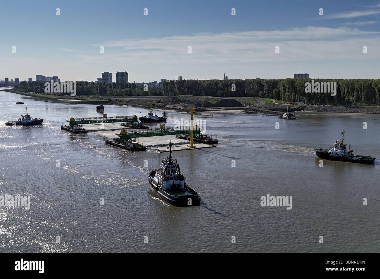 This aerial drone image shows the sinking of the first of eight tunnel ...