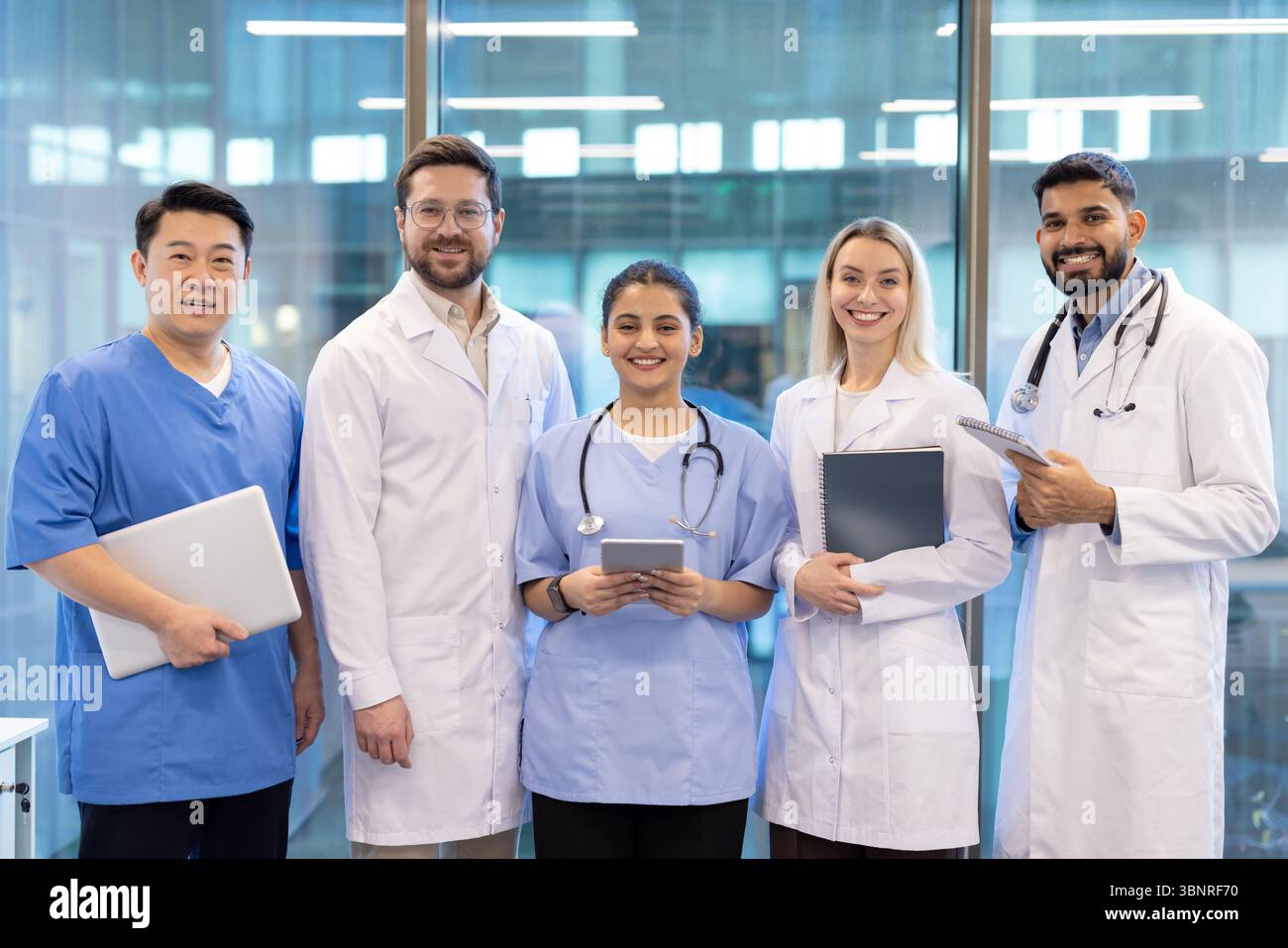 A diverse team of medical professionals, including doctors and nurses ...