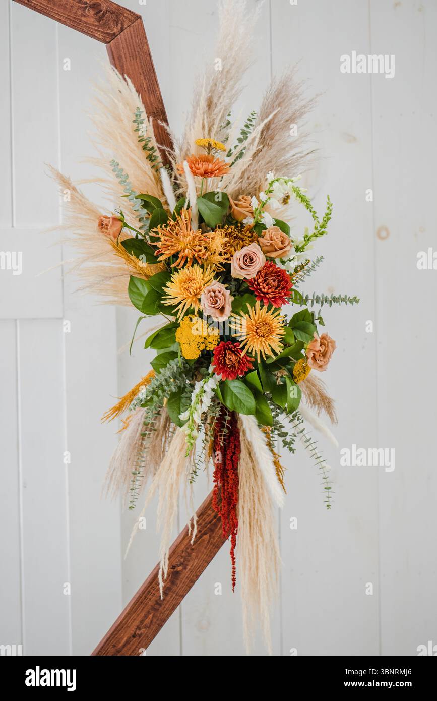 Rustic Fall Wedding Floral Arch Stock Photo - Alamy