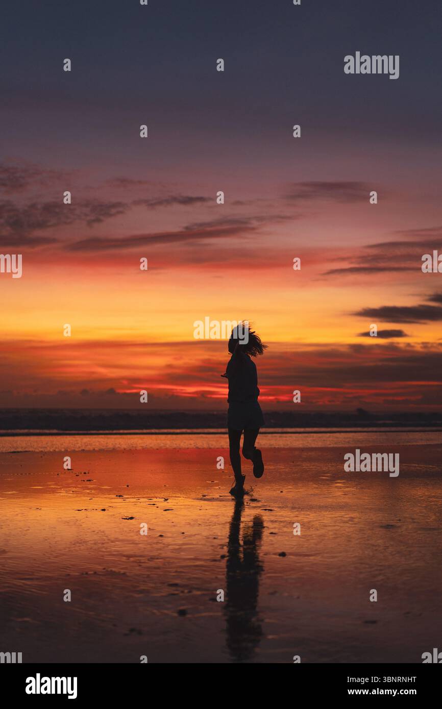 Dancing joyfully on beach woman hi-res stock photography and images - Alamy
