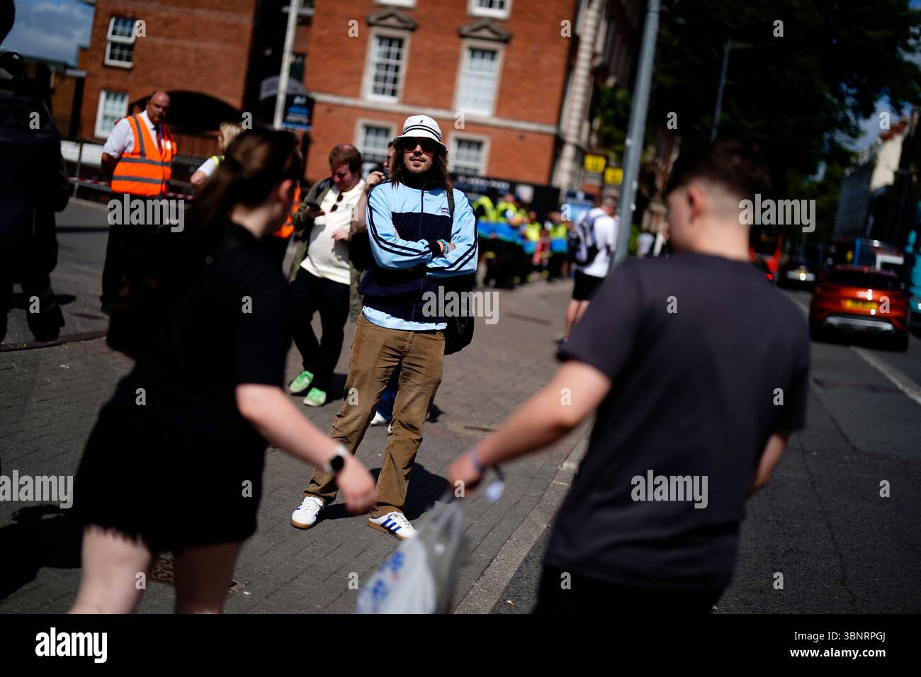 Oasis fans outside the Principality Stadium, Cardiff, as the band's ...