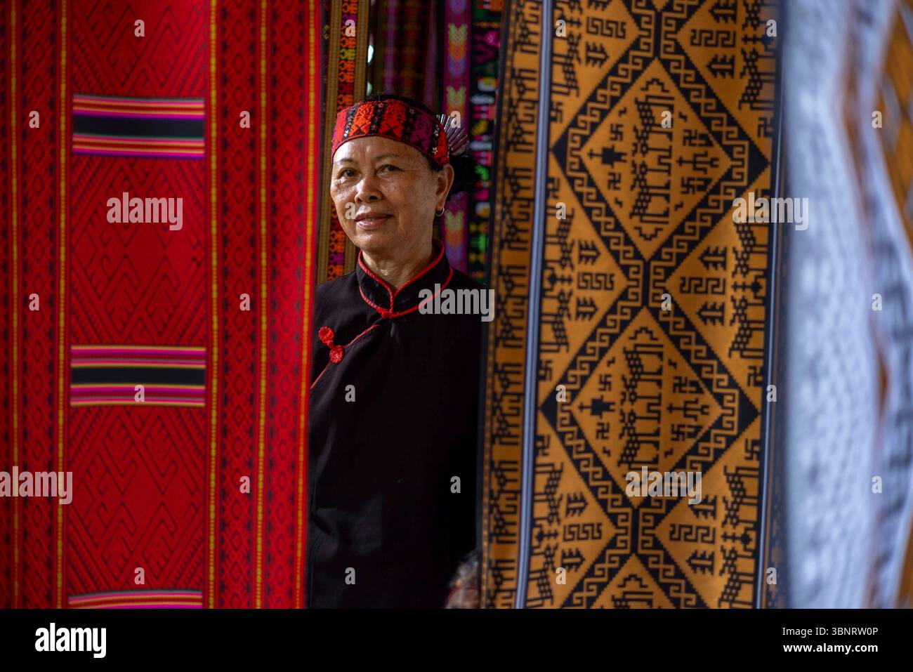 IMAGE DISTRIBUTED FOR HAINAN TOURISM - A women smiles for a photograph ...