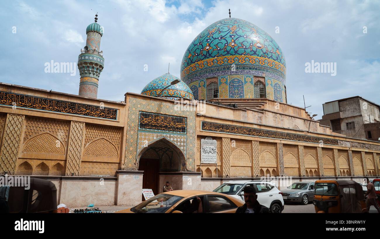 Beautiful mosque featuring colorful tile domes and detailed ...