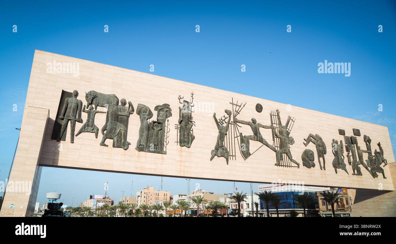 Visitors admire the intricate relief sculptures at the Freedom Monument ...