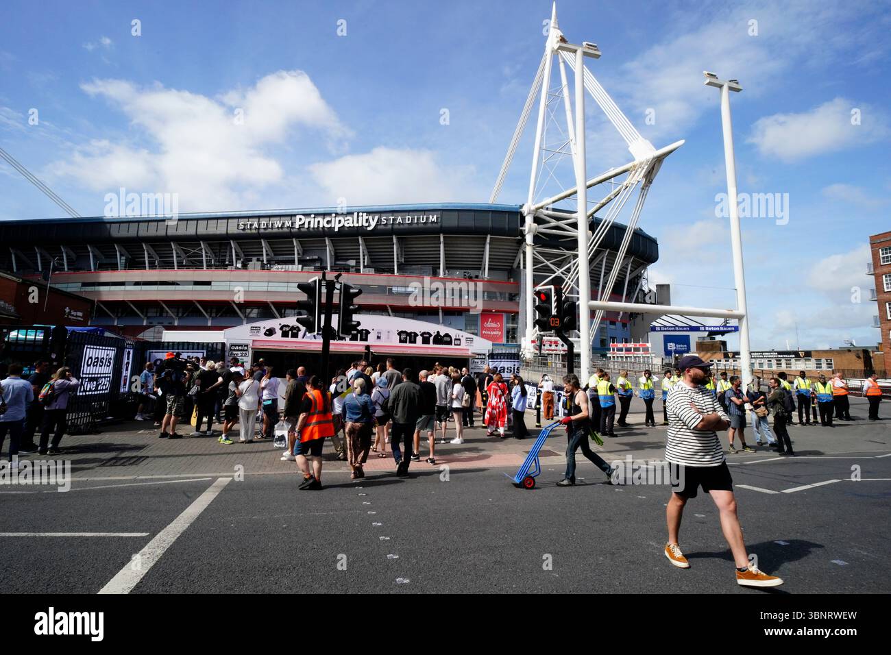Oasis fans outside the Principality Stadium, Cardiff, as the band's ...
