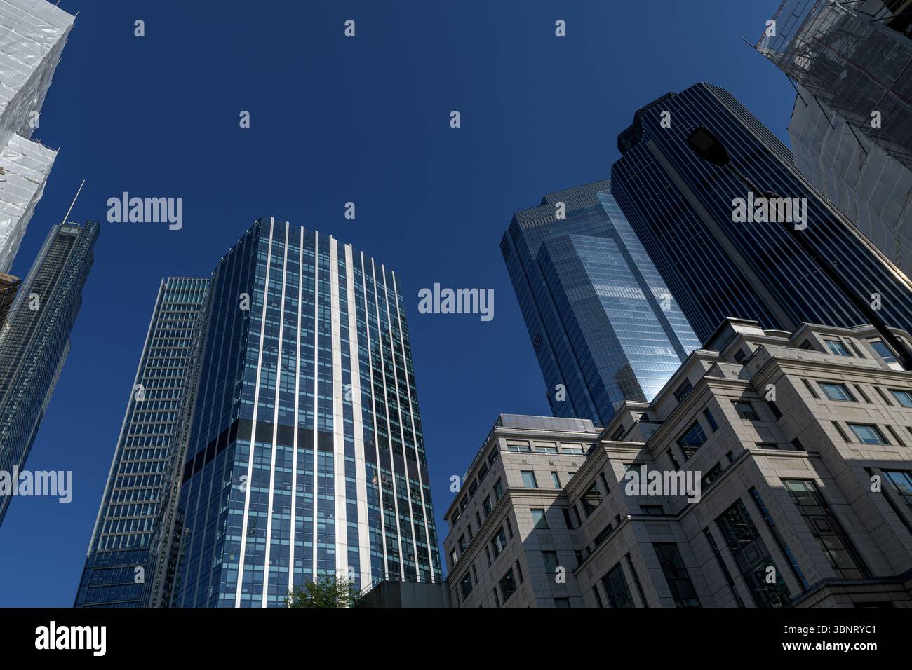 United Kingdom, London, 09 Jul 2025. Low-angle view of modern ...