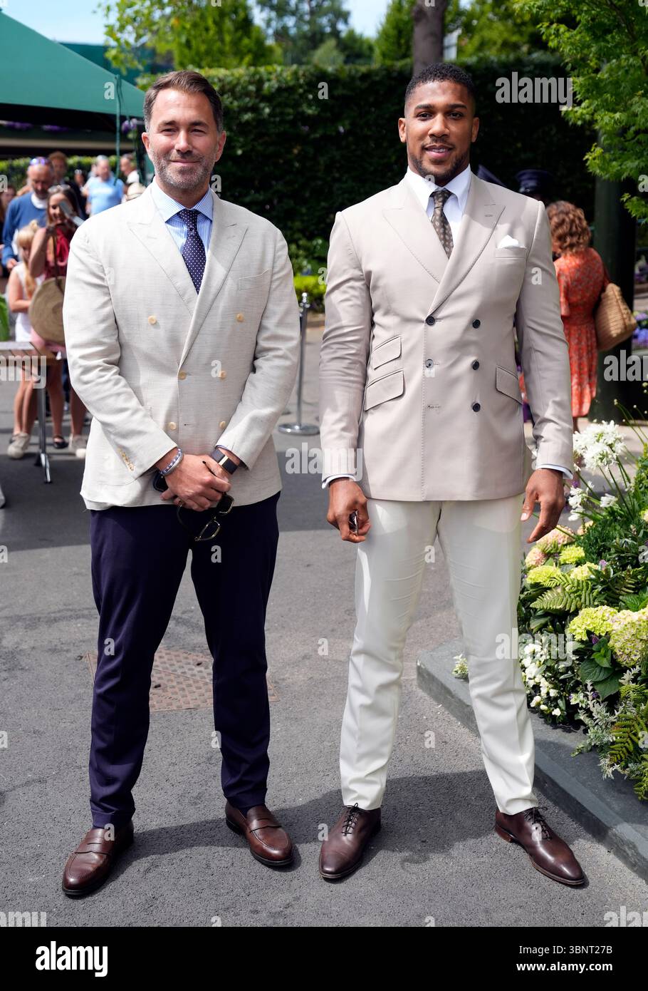 Anthony Joshua with Eddie Hearn on day five of the 2025 Wimbledon ...