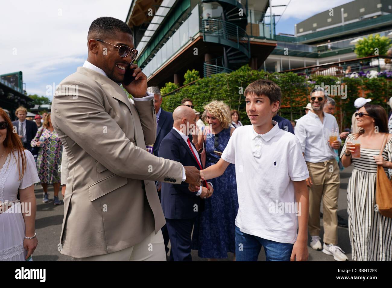 Anthony Joshua meeting a fan whilst attending day five of the 2025 ...