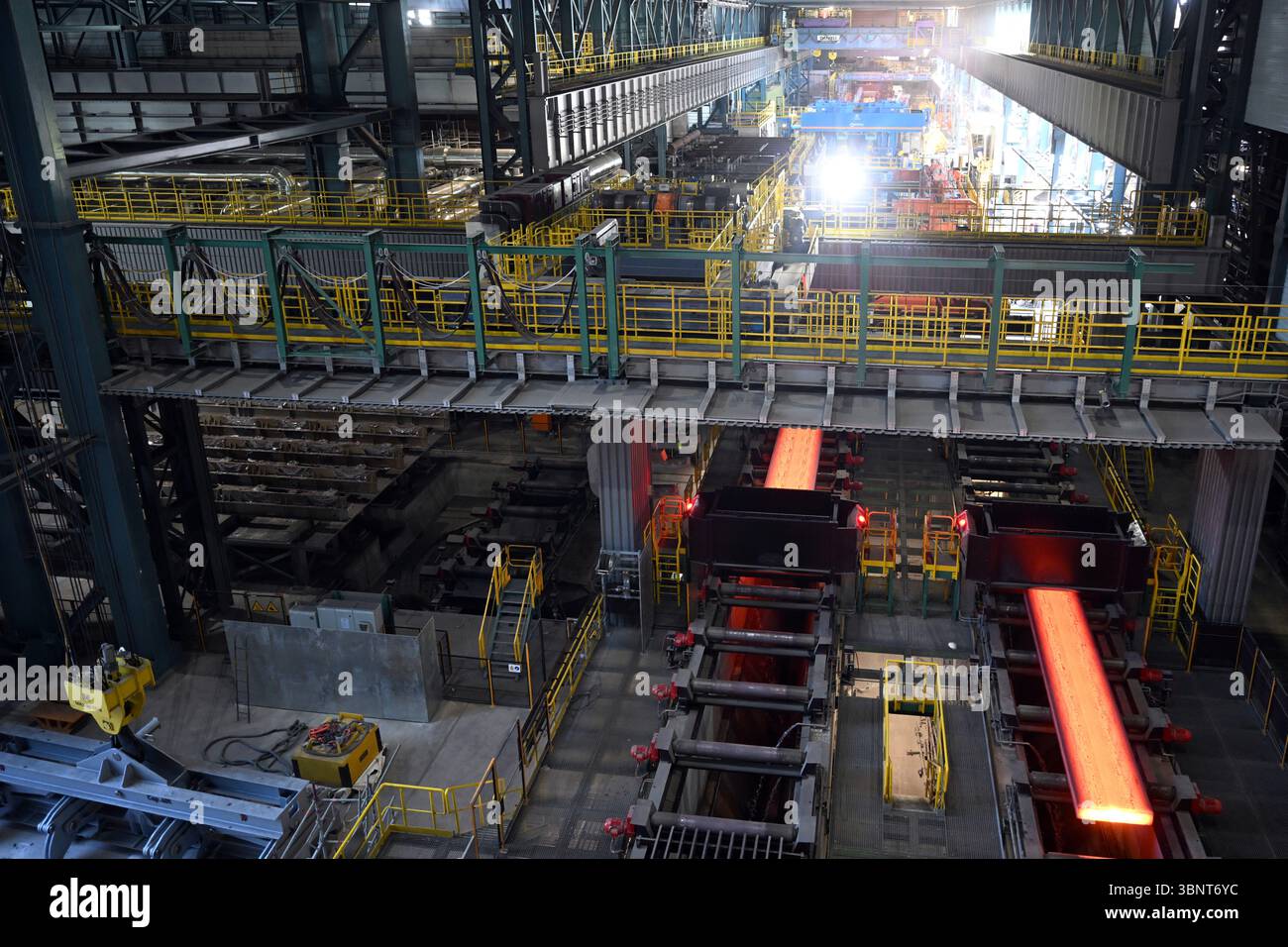 Duisburg, Germany. 04th July, 2025. Blooming slabs come out of the ...