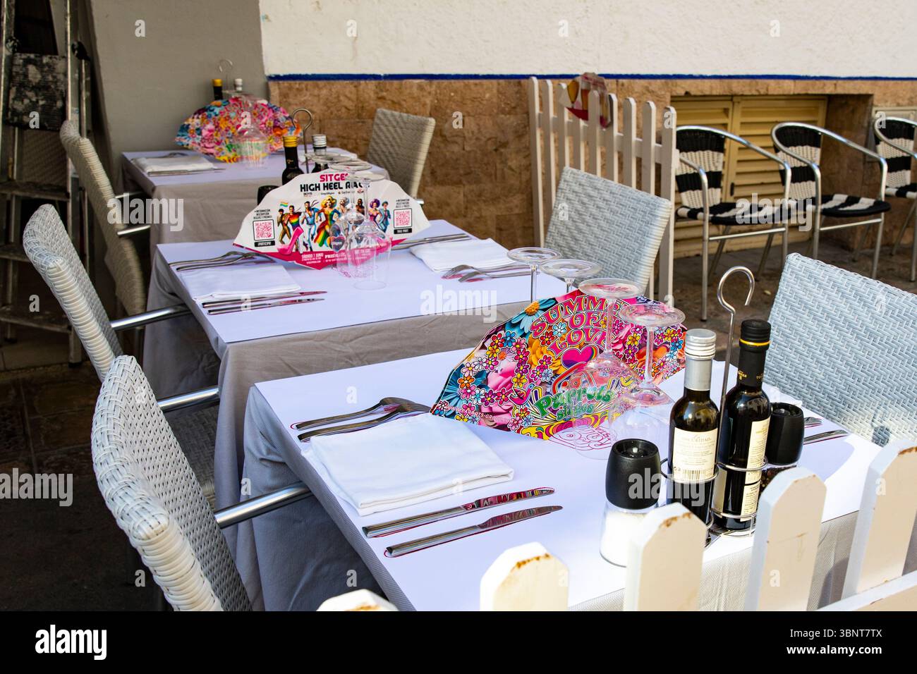 Tables of a LGBT restaurant in Sitges, Spain, 03.07.2025, ready for the ...