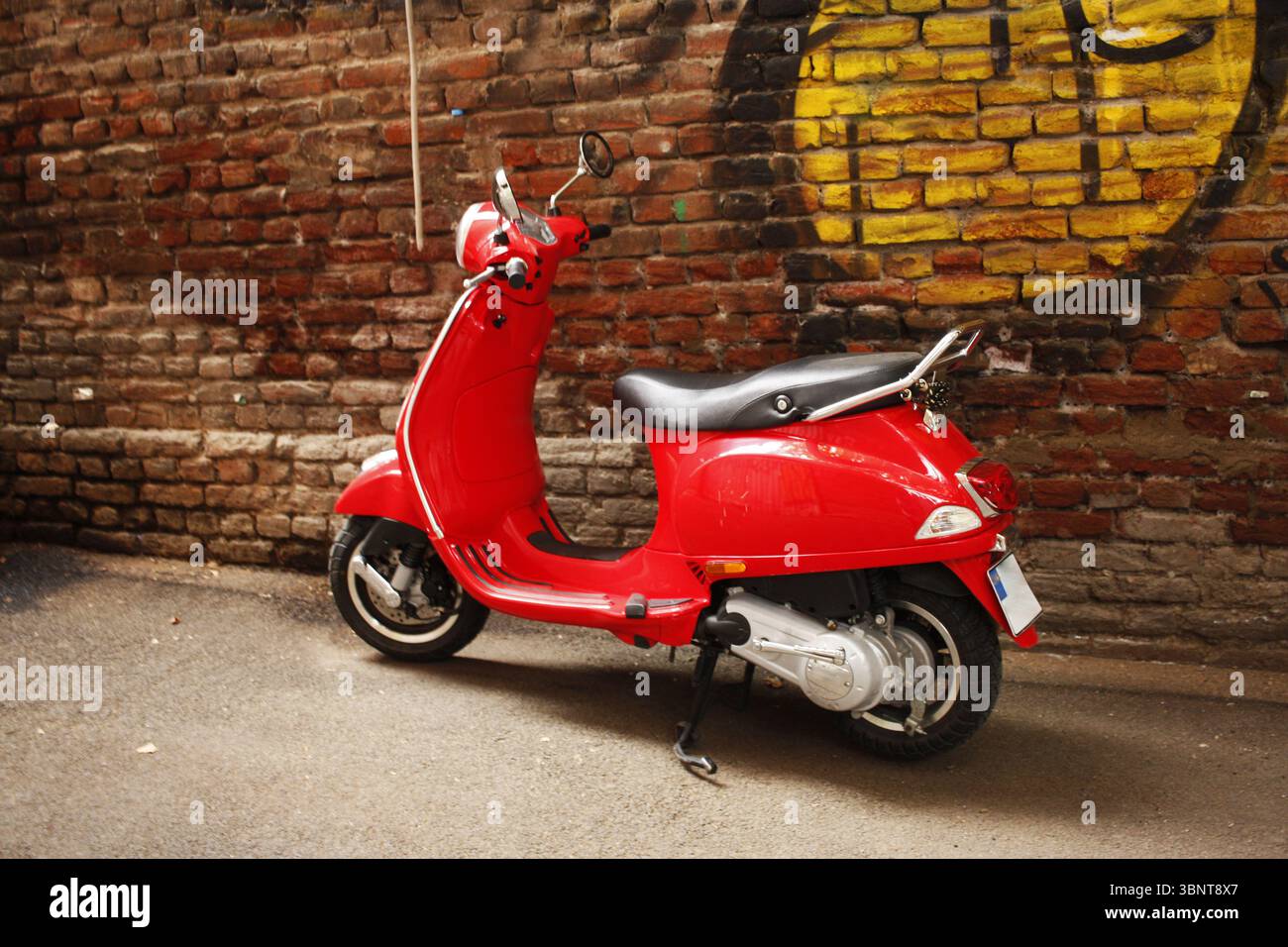 Vintage electric scooter red hi-res stock photography and images - Alamy