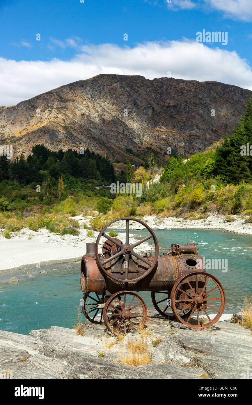 An old Steam engine from the gold rush on the Shotover River near ...