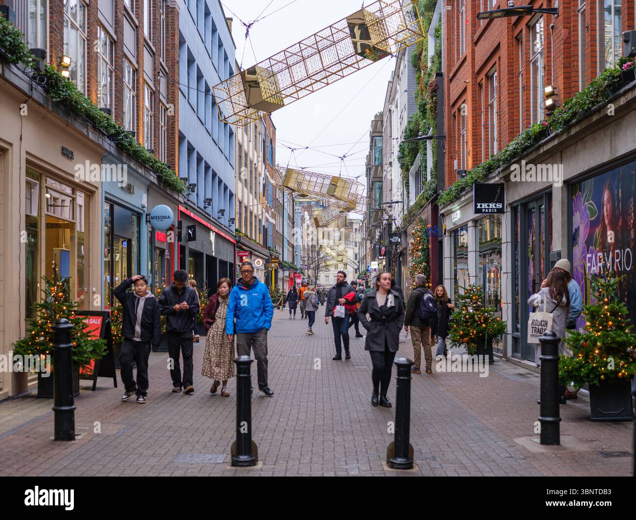 London, UK, 16 Dec 2024. Iconic 'Welcome to Carnaby Street' sign with ...