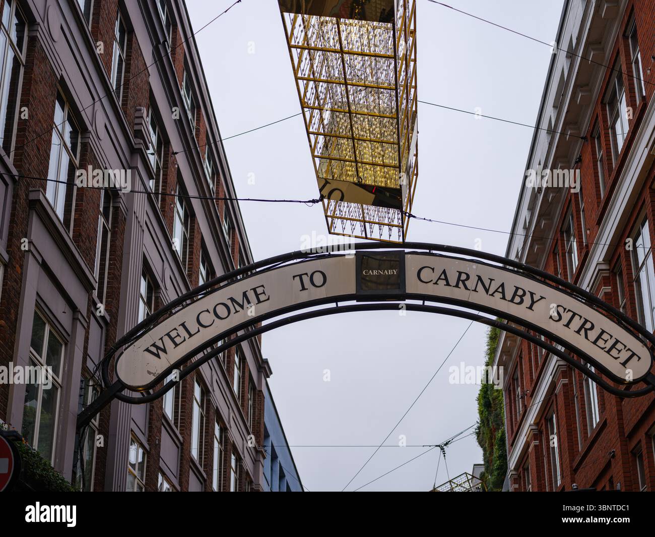 London, UK, 16 Dec 2024. Iconic 'Welcome to Carnaby Street' sign with ...