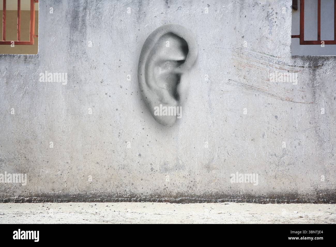 Human ear in old white wall. Eavesdropping, concept that even walls ...