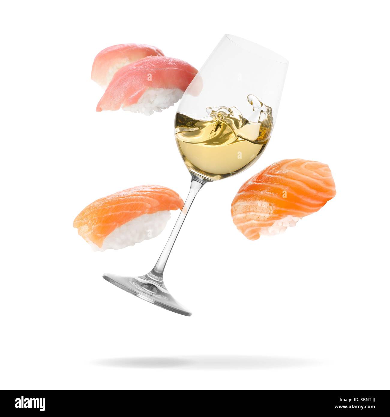 Wine in glass and nigiri sushi falling on white background Stock Photo ...