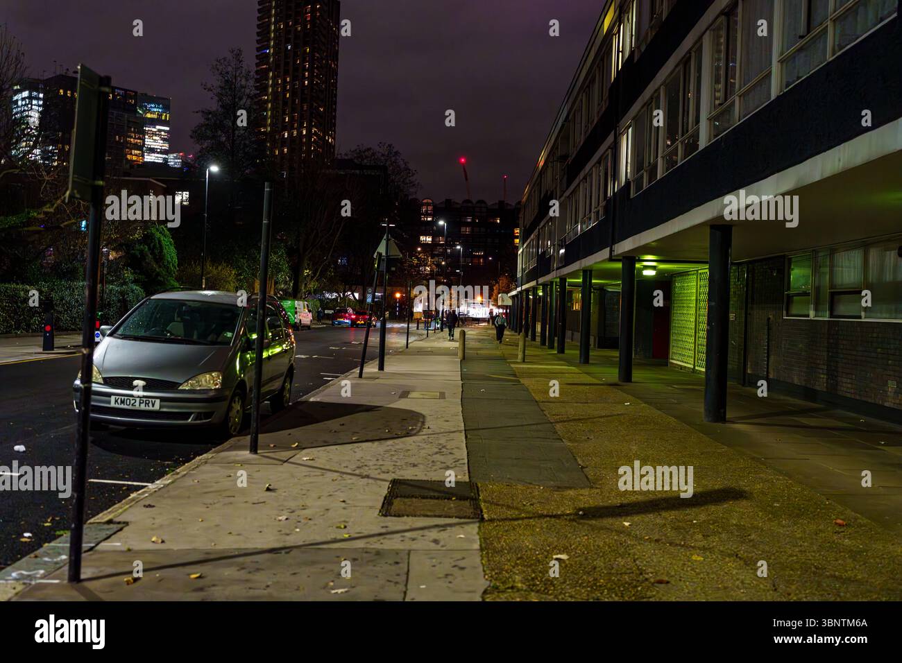 London, UK, 02 Dec 2024. Night street scene near Barbican with ...