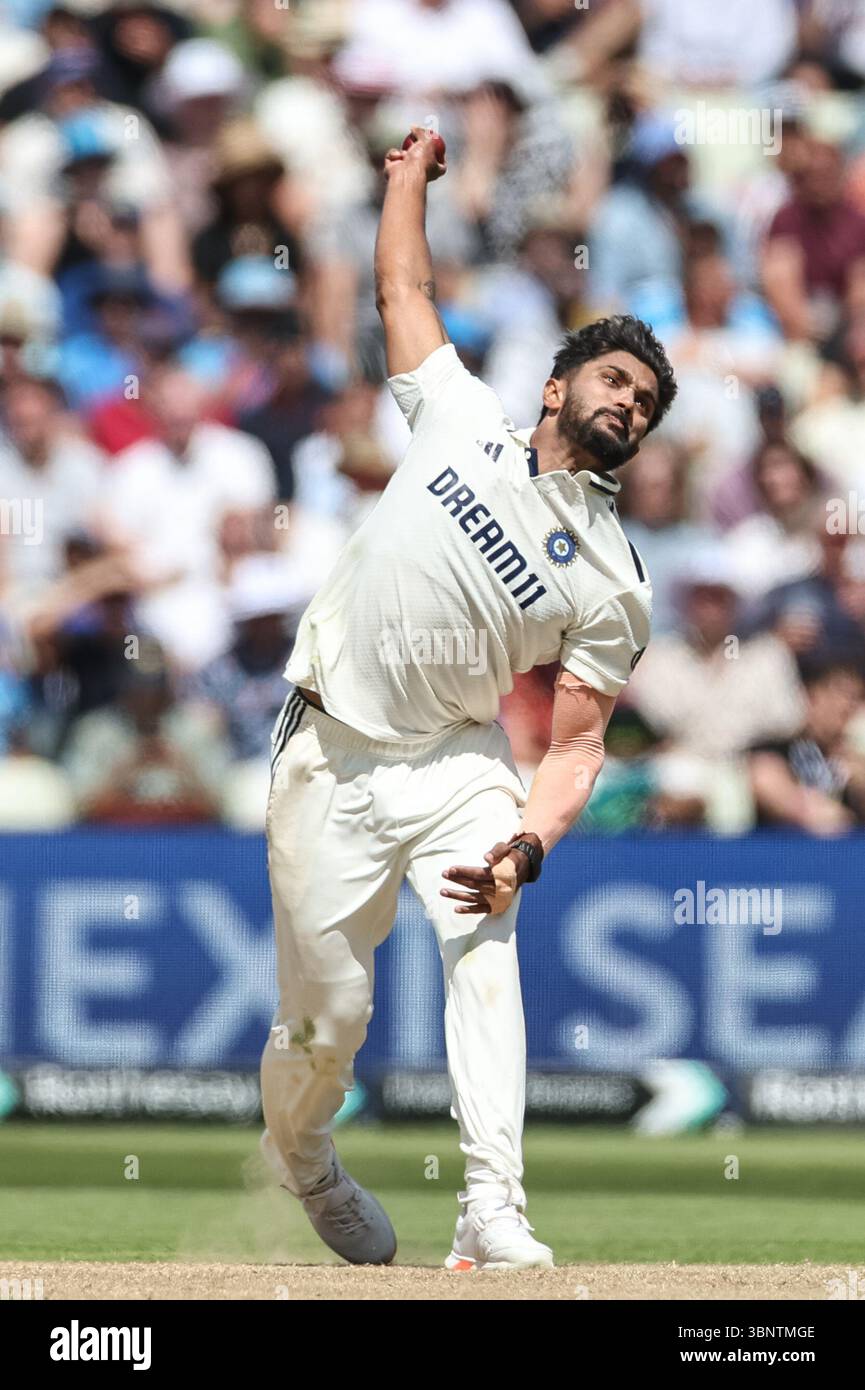 Nitish Kumar Reddy of India delivers the ball during the 2nd Rothesay ...
