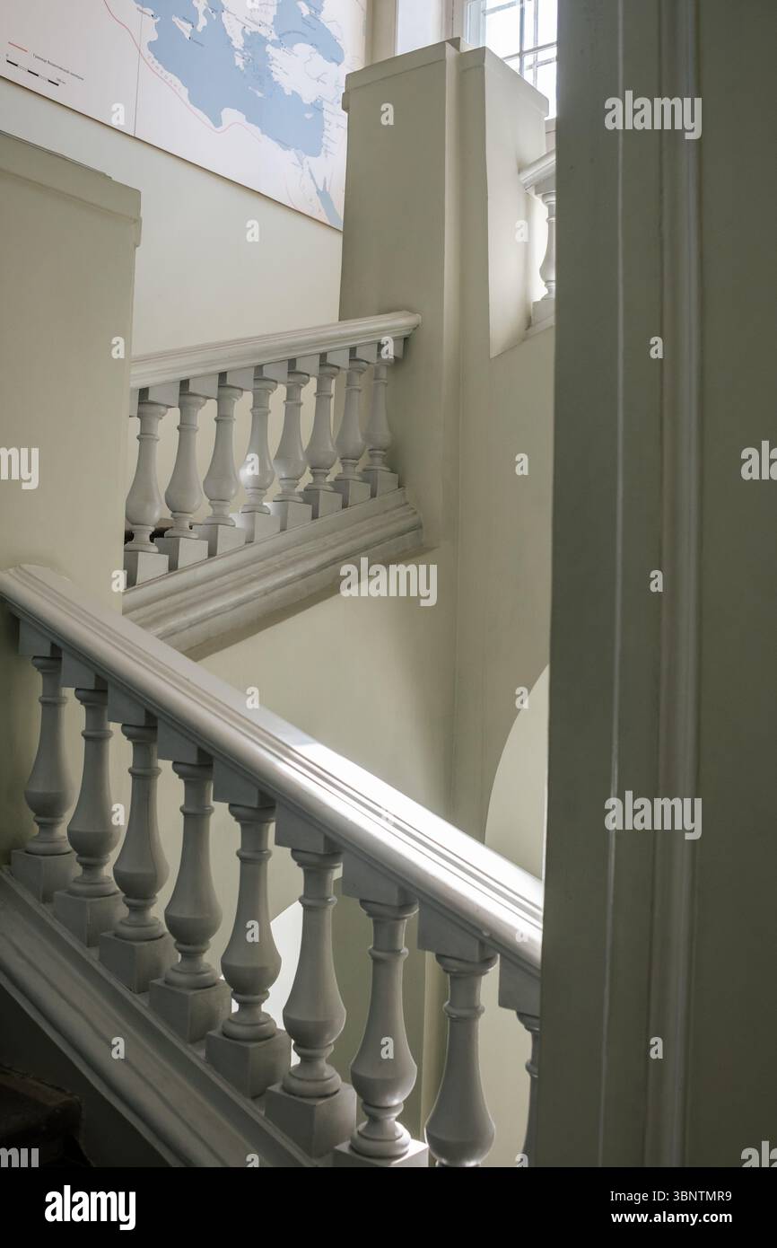 Elegant White Staircase Leading to Upper Levels in a Bright Indoor ...