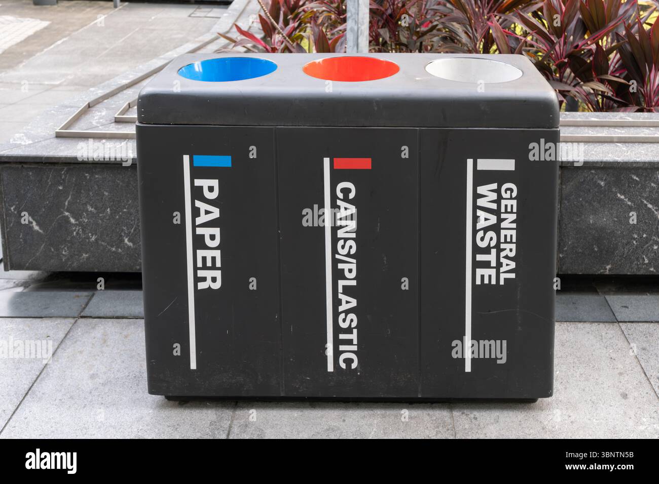 Recycling bin with labeled compartments for waste management in Orchard ...