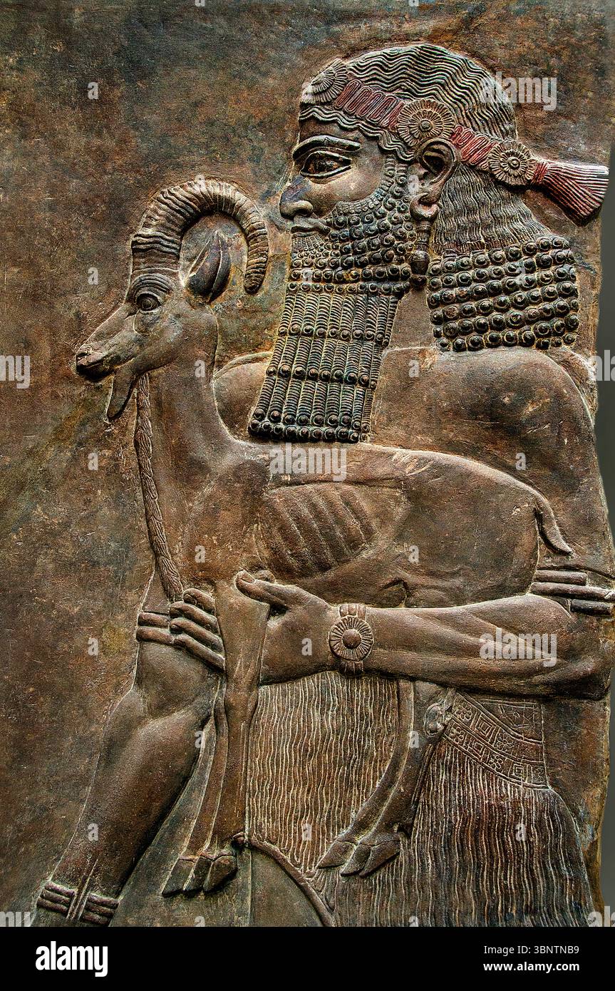 Person holding an ibex Neo Assyrian palace of Sargon II 721-705 BC ...