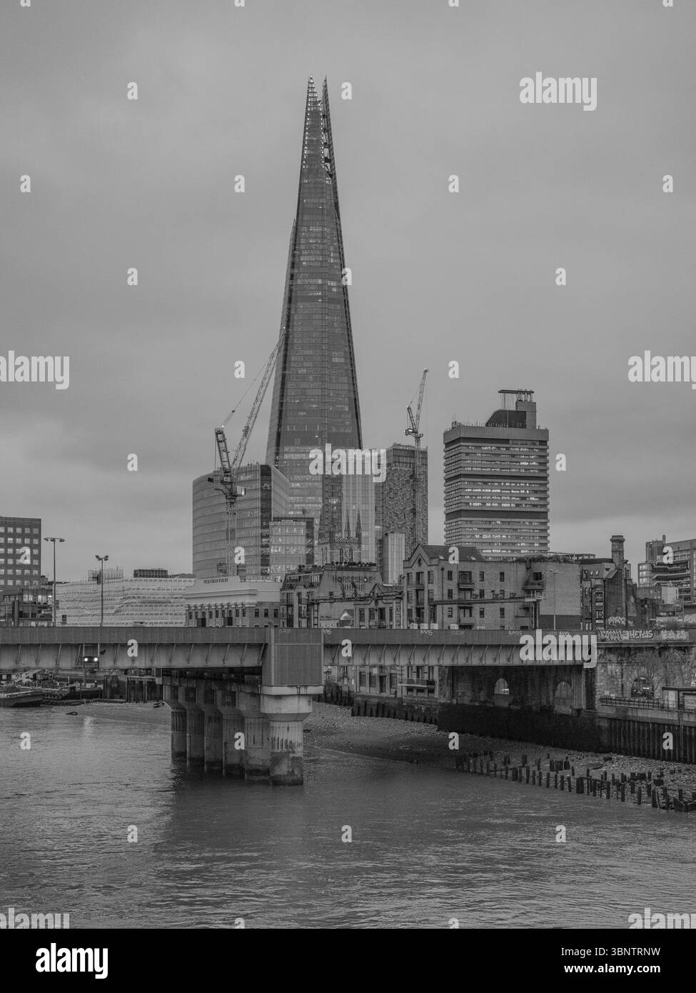 City buildings across river Black and White Stock Photos & Images - Alamy