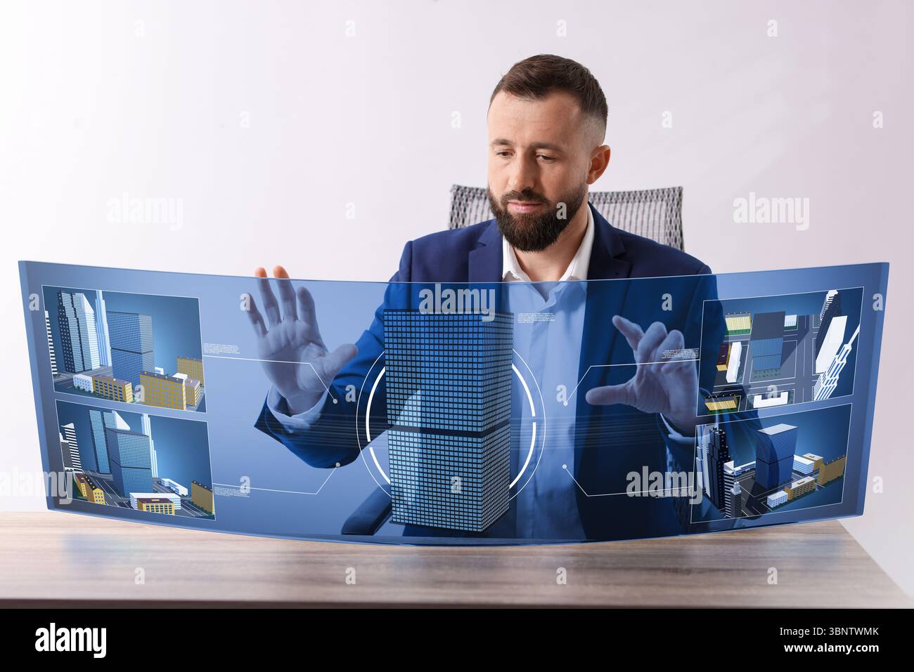 Building information modelling. Man using virtual screen in office ...