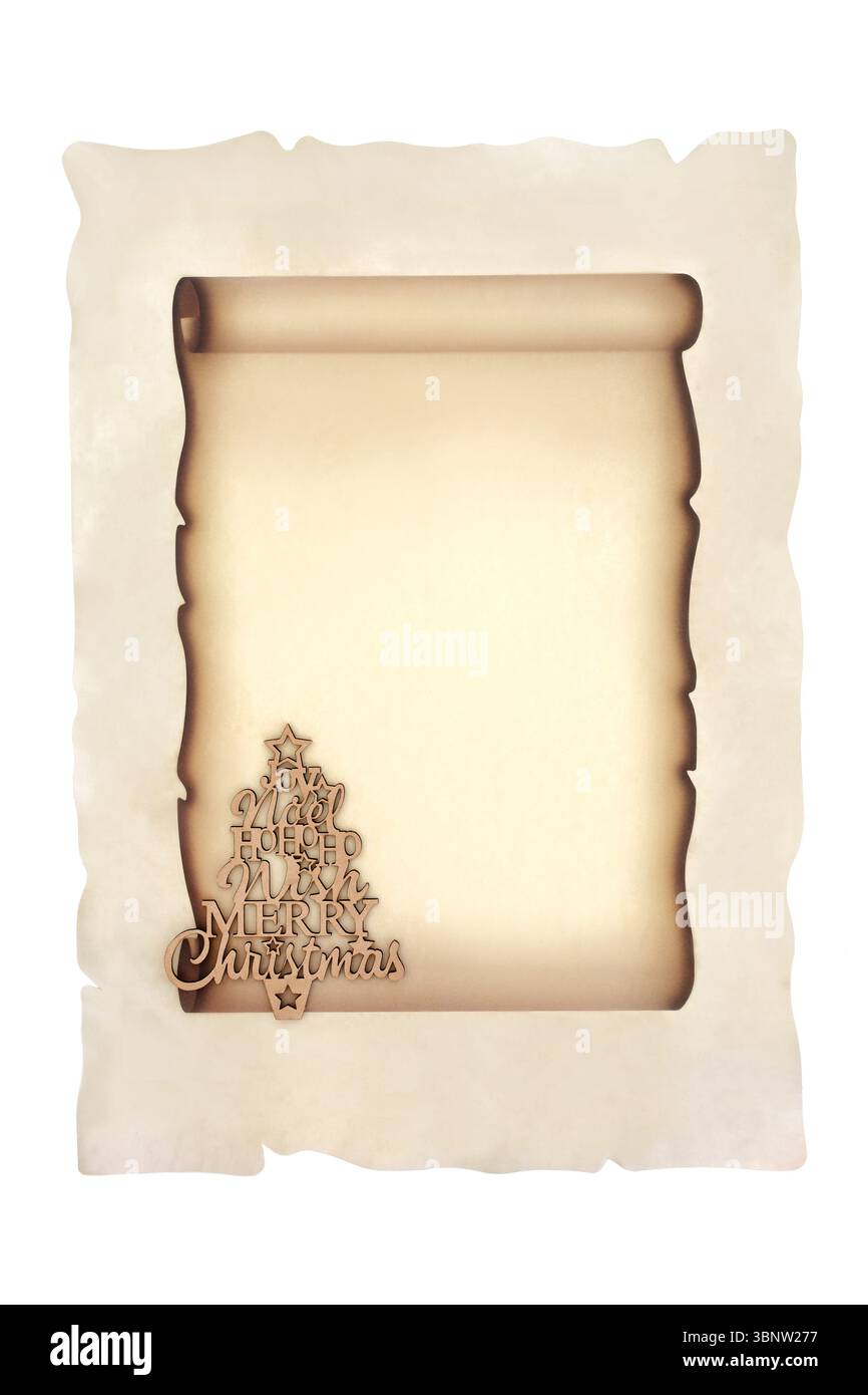 Parchment paper scroll with natural wooden Christmas tree decoration on ...