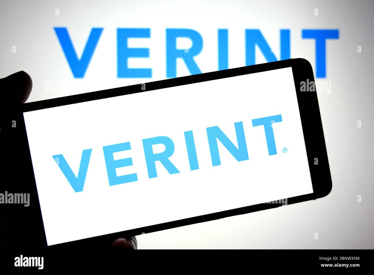 In this photo illustration, a VERINT logo is seen displayed on a ...