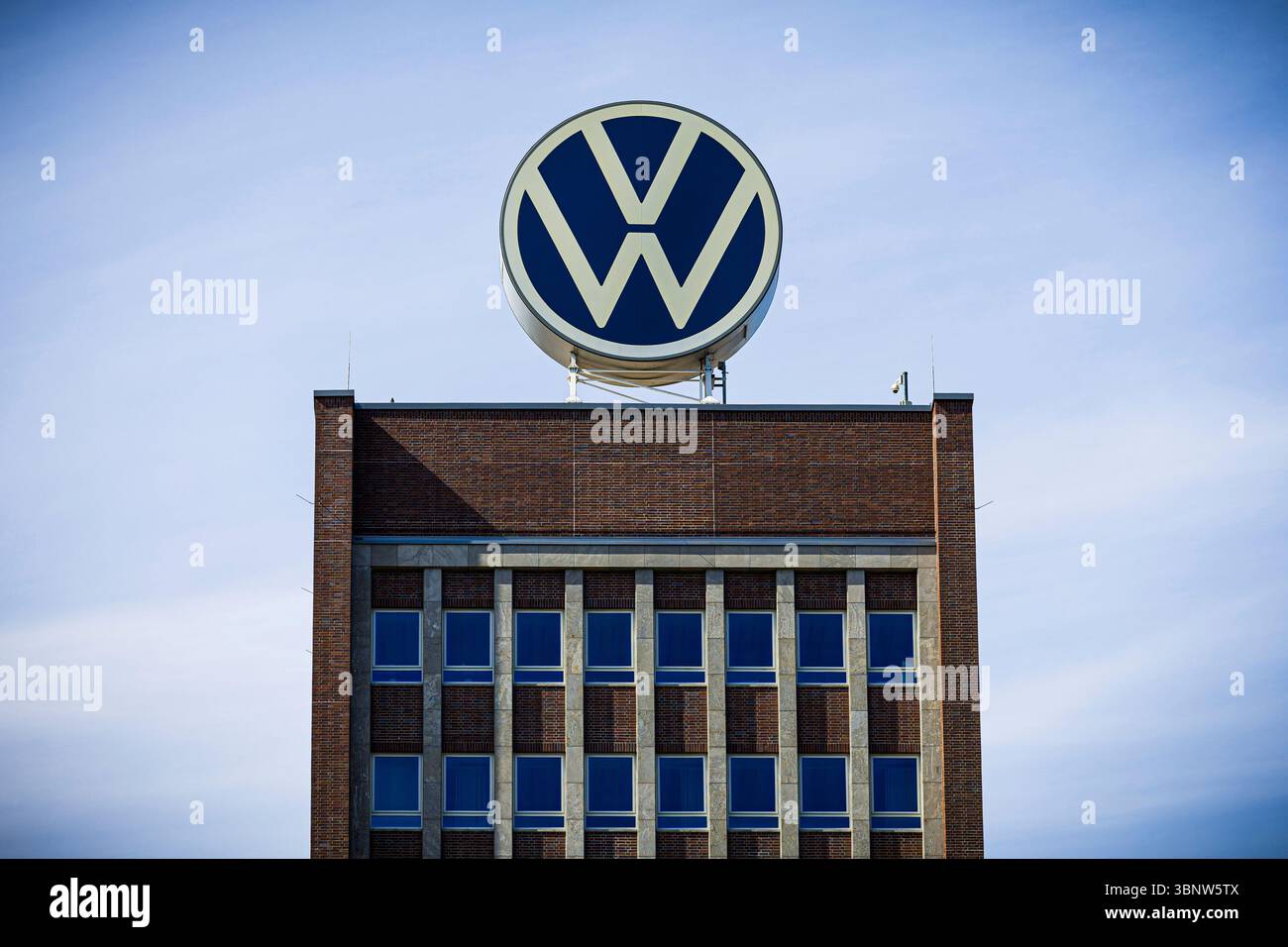 The Volkswagen logo is displayed on the roof of the VW brand tower in ...
