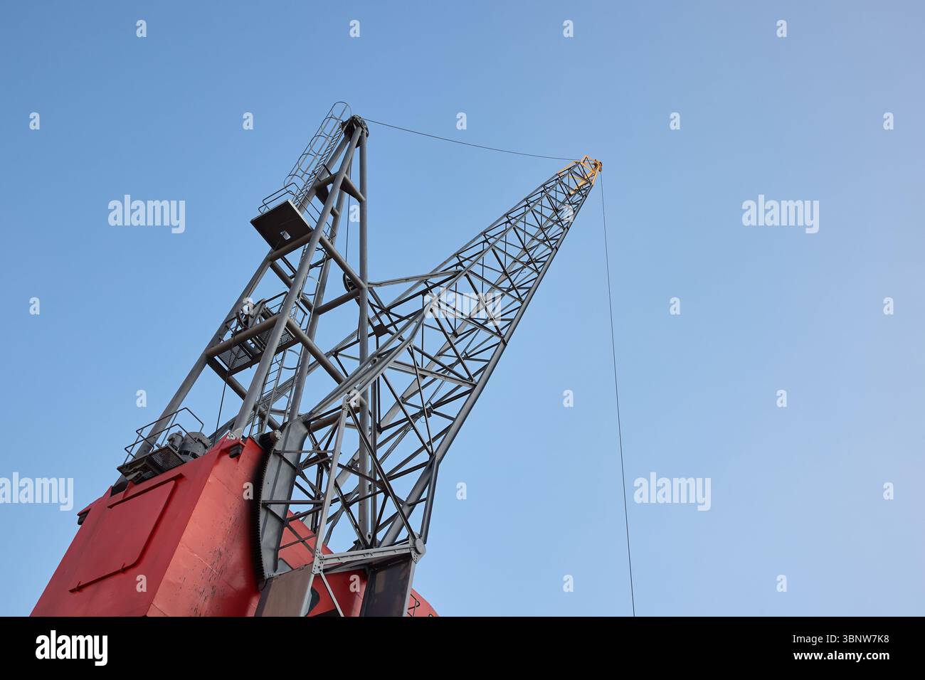 Old dock freight crane in a cargo port Stock Photo - Alamy