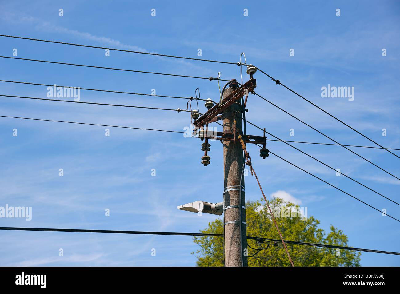 Electric line grid in a village Stock Photo - Alamy