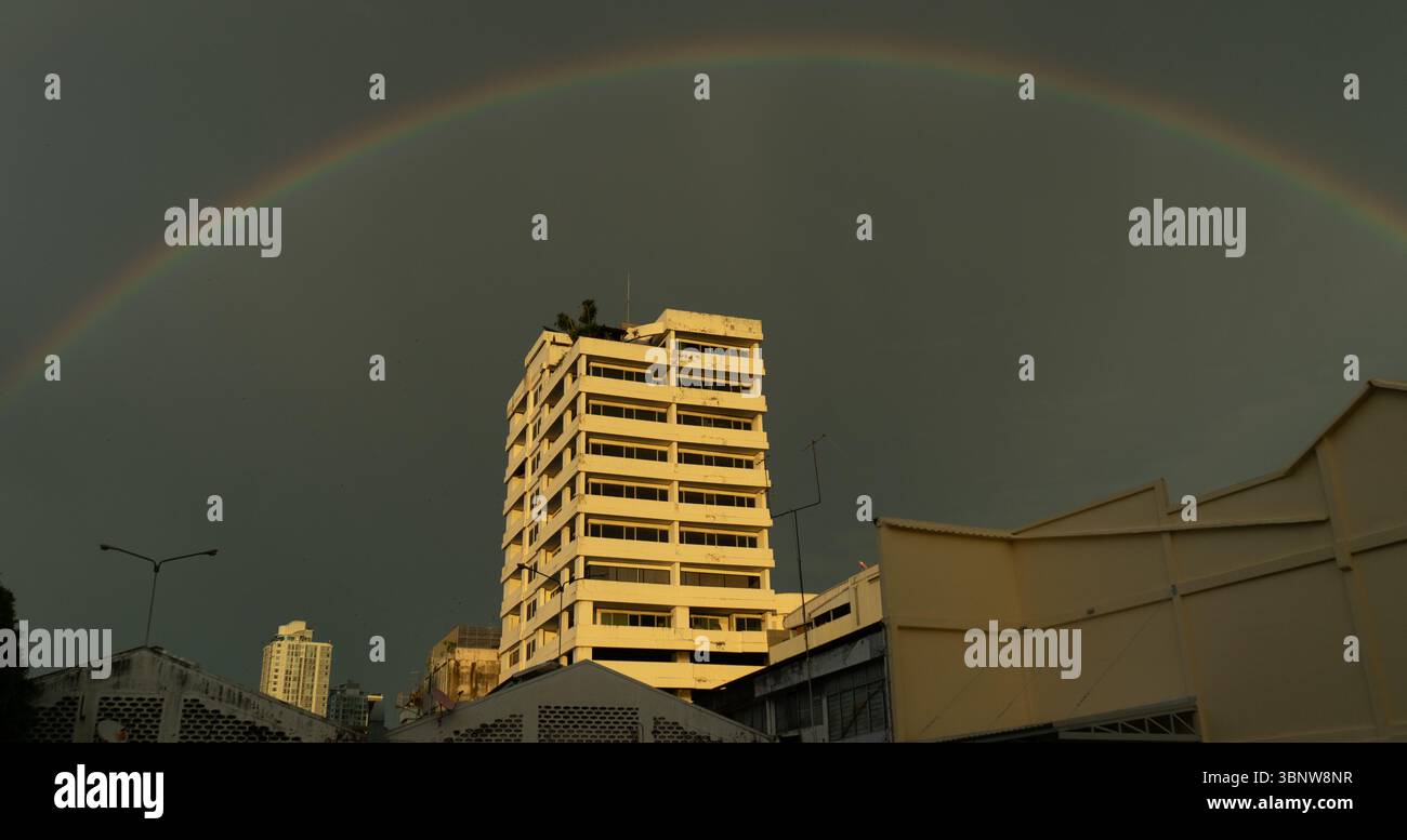 Rainbow over buildings in hi-res stock photography and images - Alamy