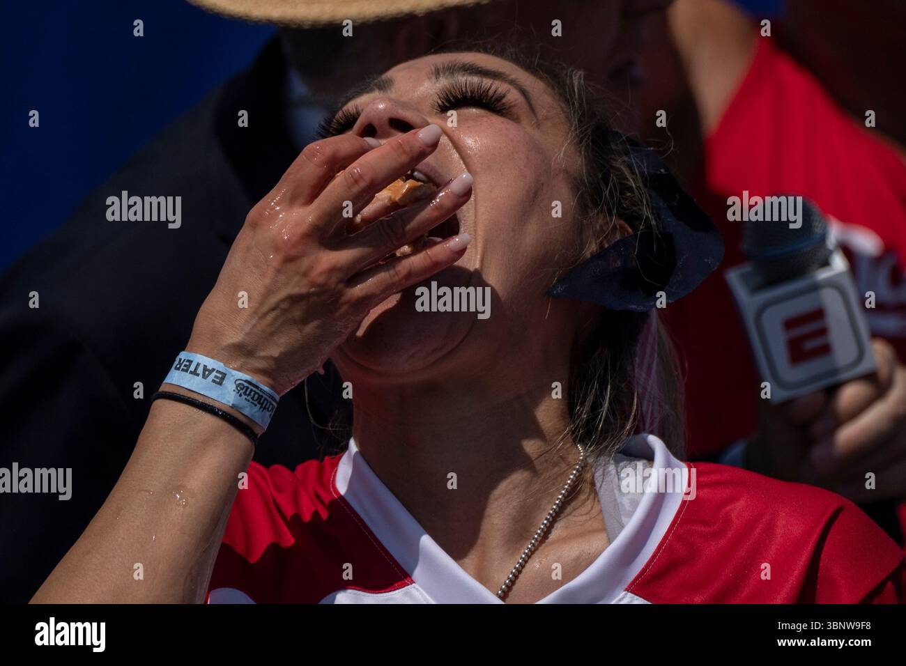 Competitive eater Miki Sudo eats hot dog during the 2025 Nathan's Famous Fourth of July hot dog ...