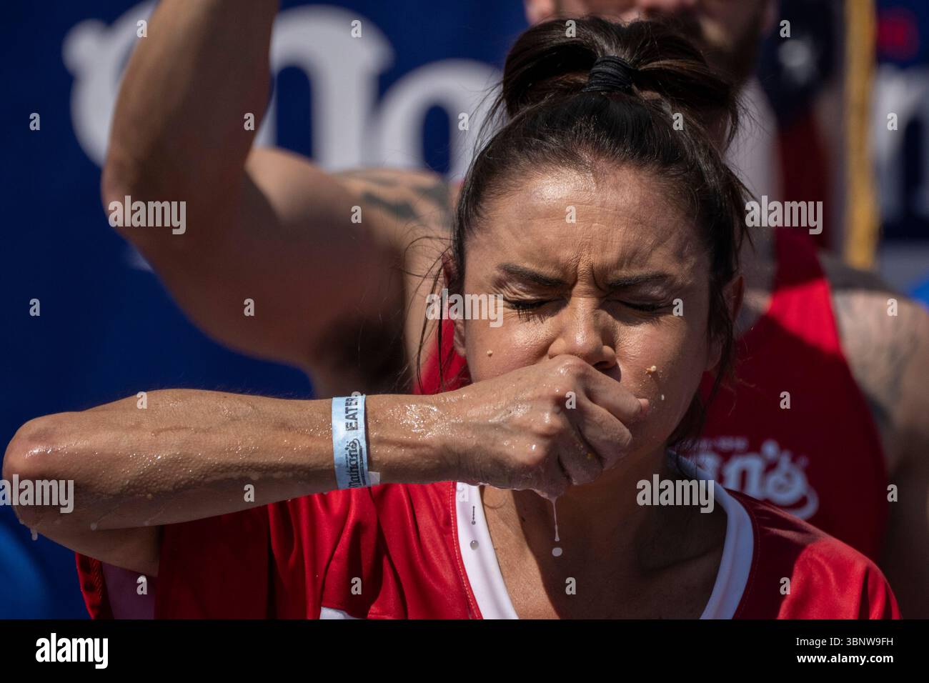 Competitive eater Michelle Lesco eats hot dog during the 2025 Nathan's ...