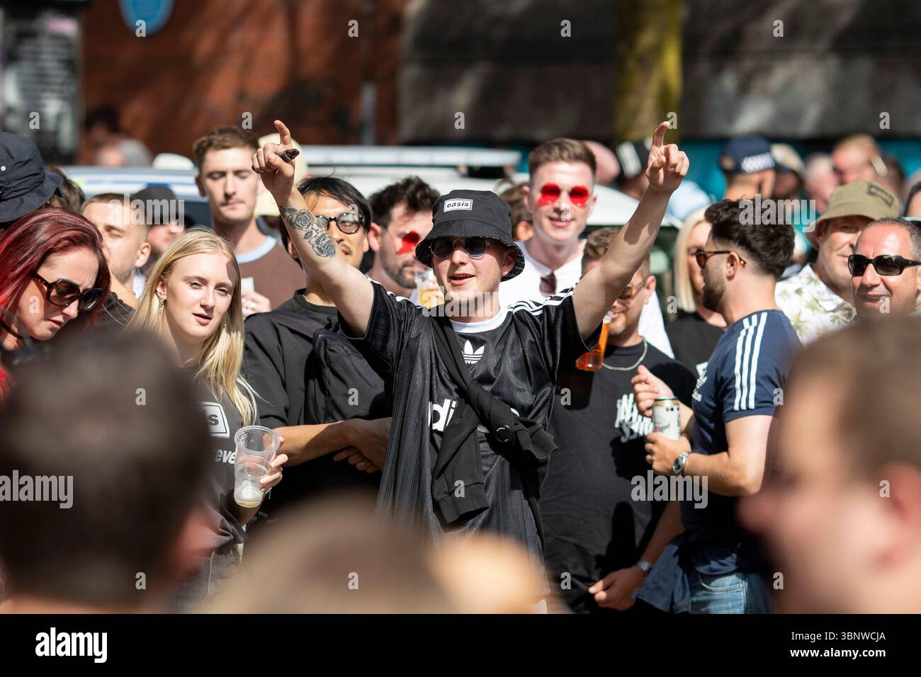 Cardiff, Wales, UK. 4th July, 2025. Oasis fans sing along to an Oasis ...