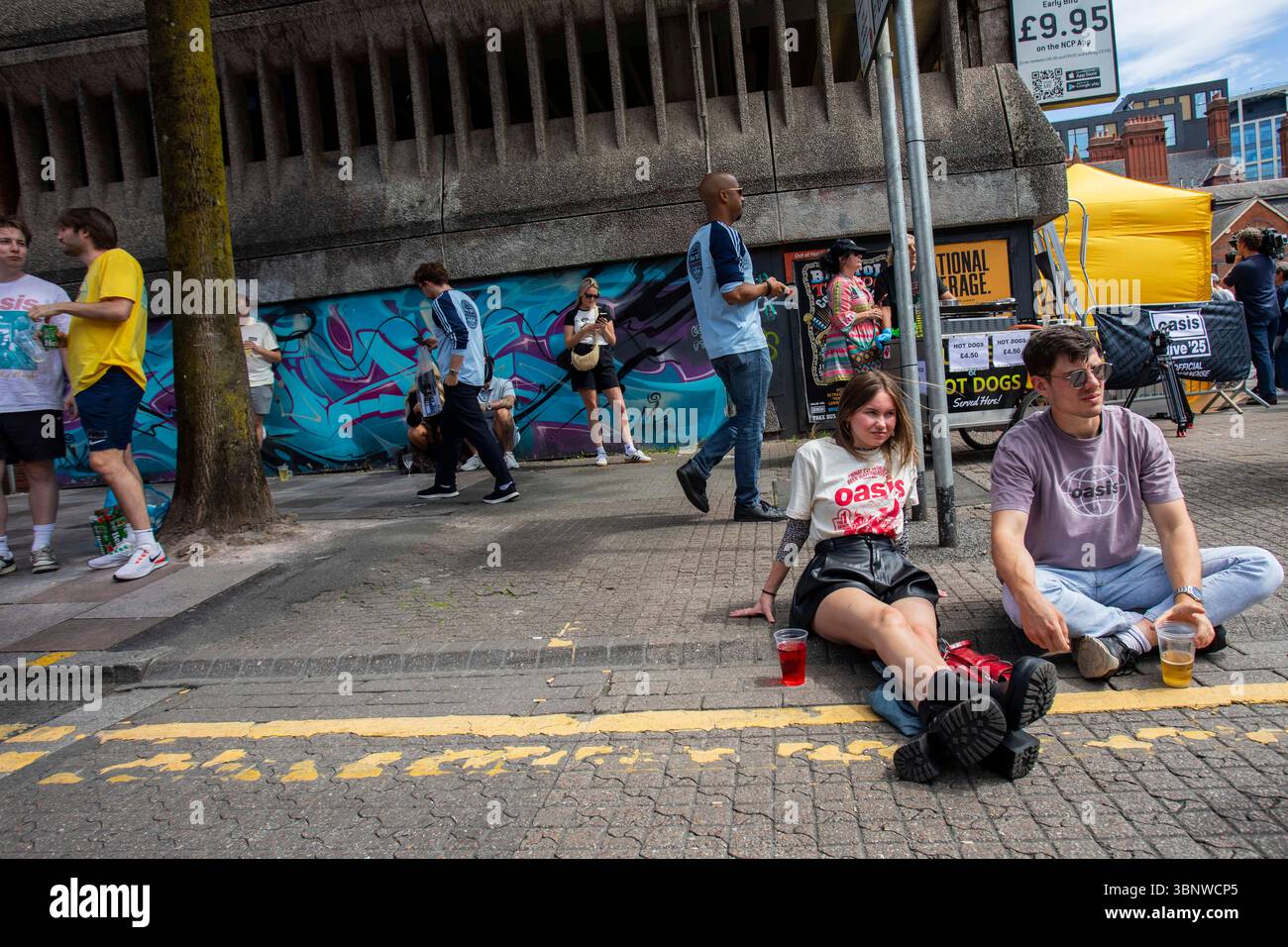 Cardiff, Wales, UK. 4th July, 2025. Oasis fans soak up the atmosphere ...