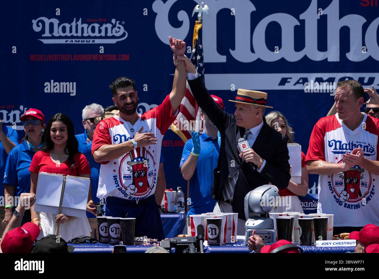Competitive eater James Webb celebrates after finishing 3rd during the ...