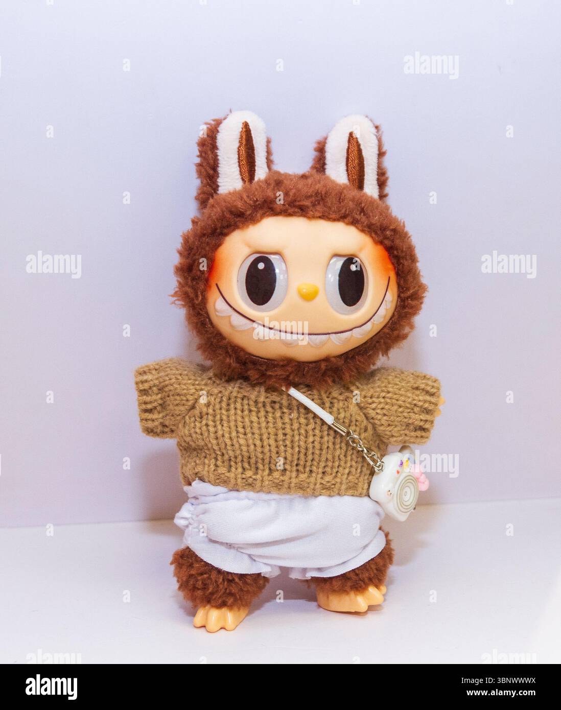 Shot of the popular toy labubu on white background Stock Photo - Alamy