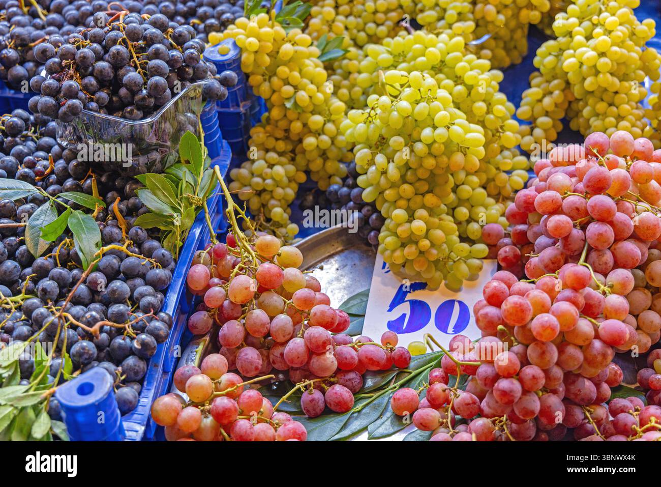 Three Different Species of Fresh Grapes Fruits at Farmers Market in ...