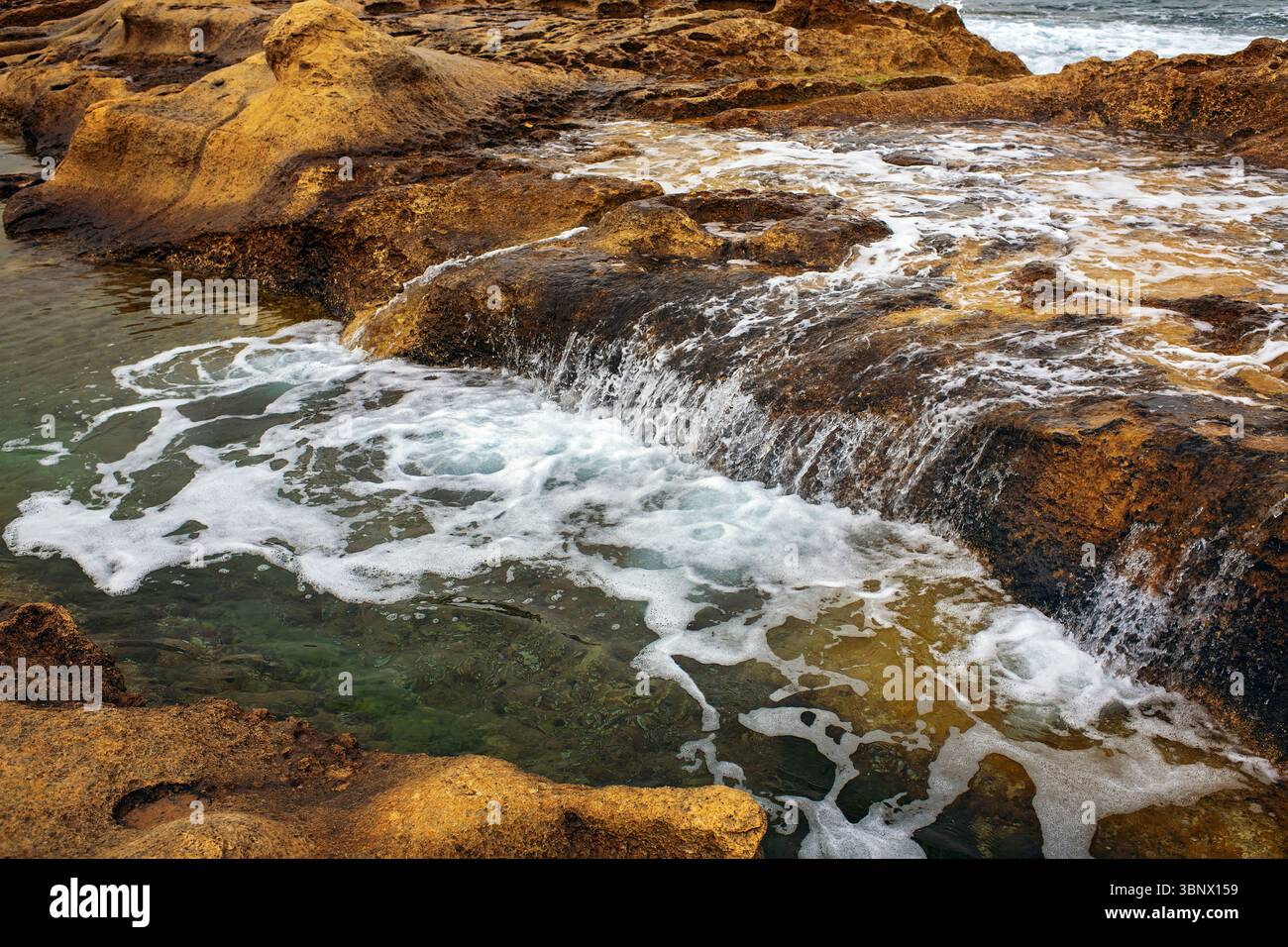 Clear water flows over edge hi-res stock photography and images - Alamy