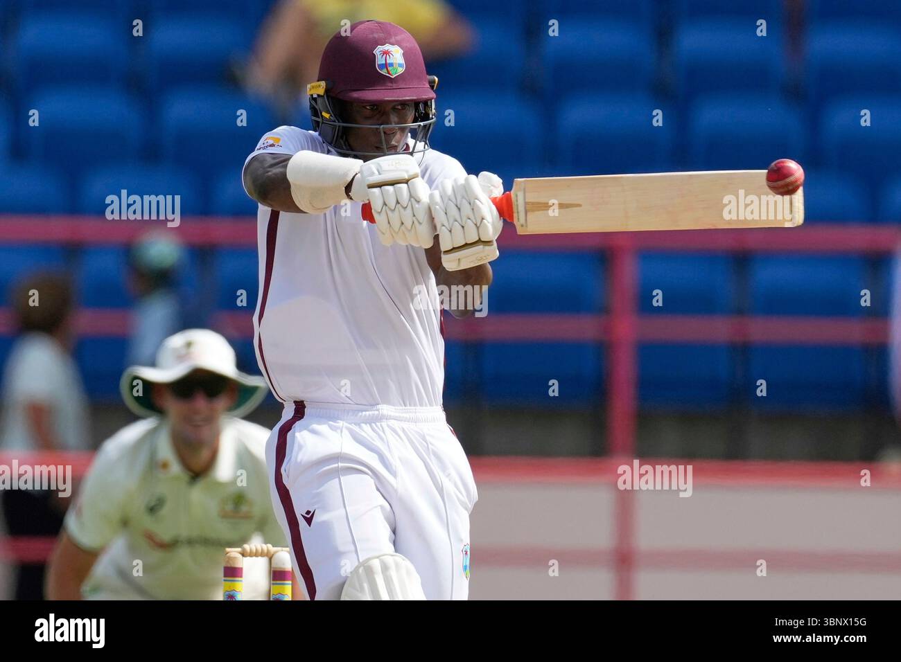 West Indies' Shamar Joseph plays a shot from a delivery of Australia's ...