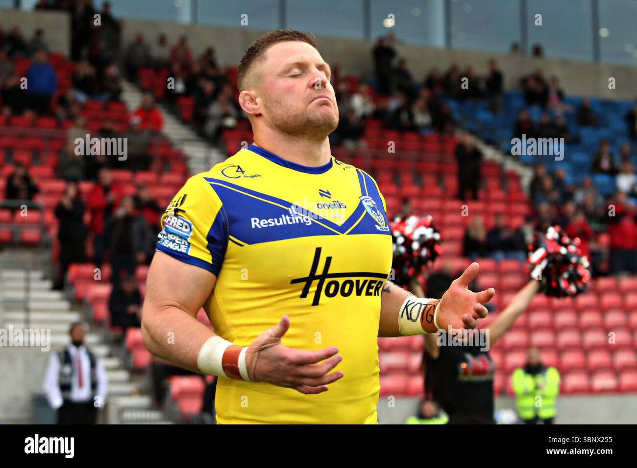 Luke Yates of Warrington Wolves runs out before the Betfred Super ...