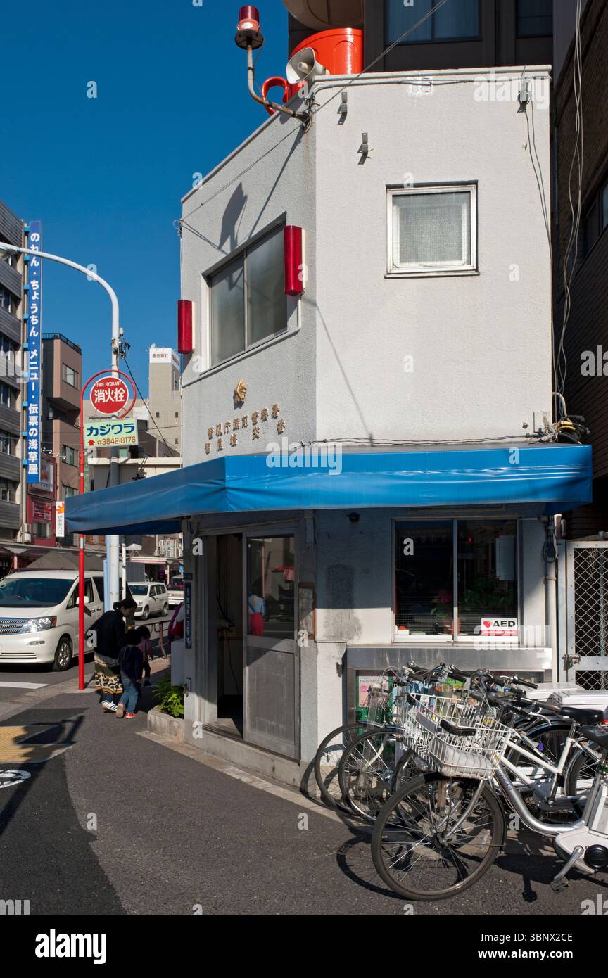 The door is open at a "koban" police box in Kappabashi, Tokyo. Unique ...