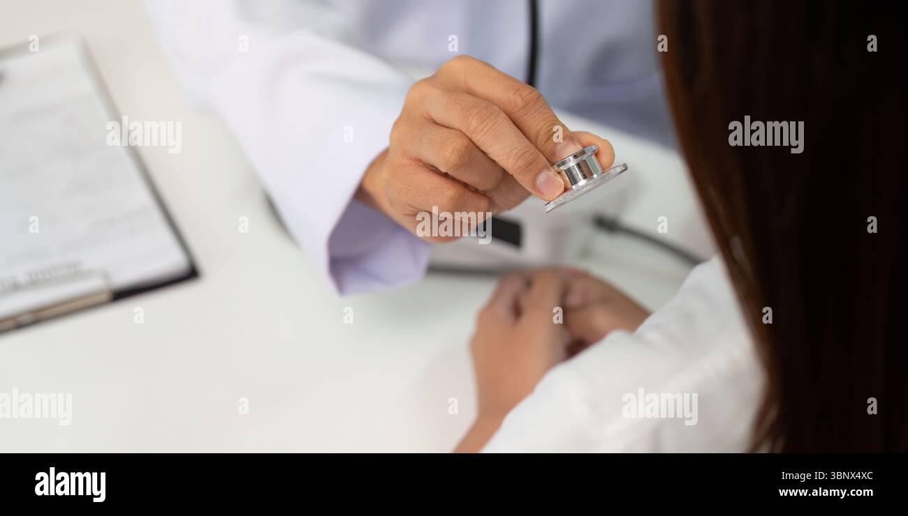 Stethoscope Examination. Doctor using stethoscope to assess patient's ...