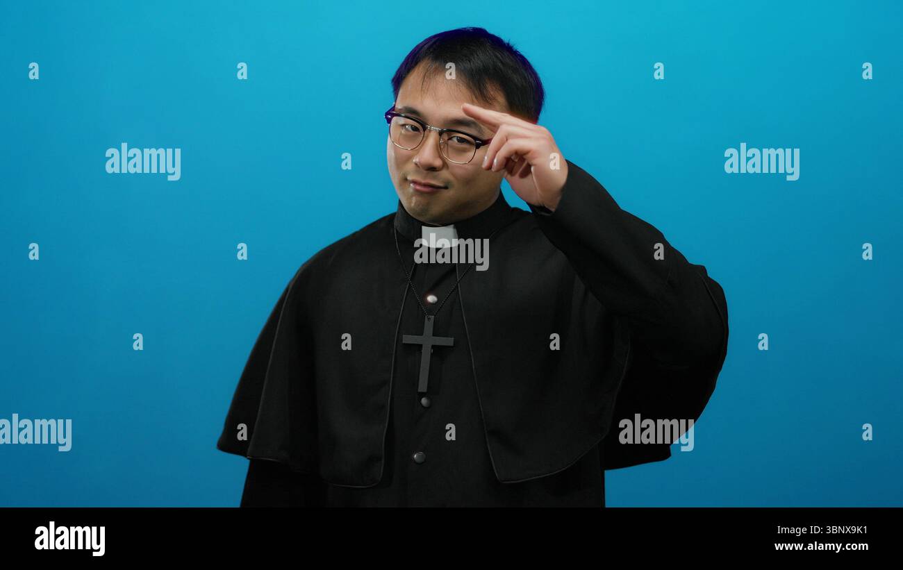 Man wearing priest attire posing hi-res stock photography and images ...
