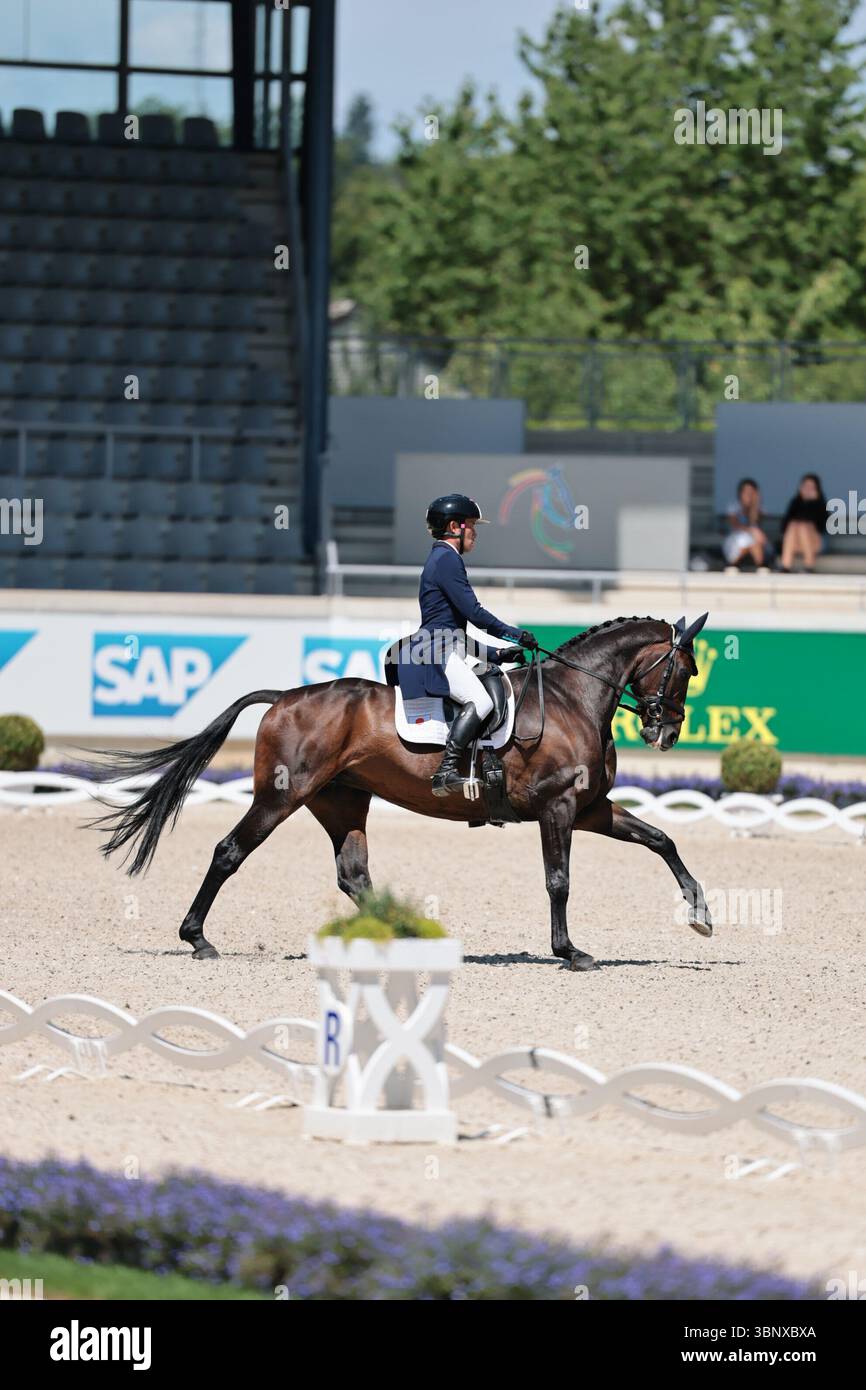 Ryuzo Kitajima of Japan with Be My Daisy during the dressage of the ...