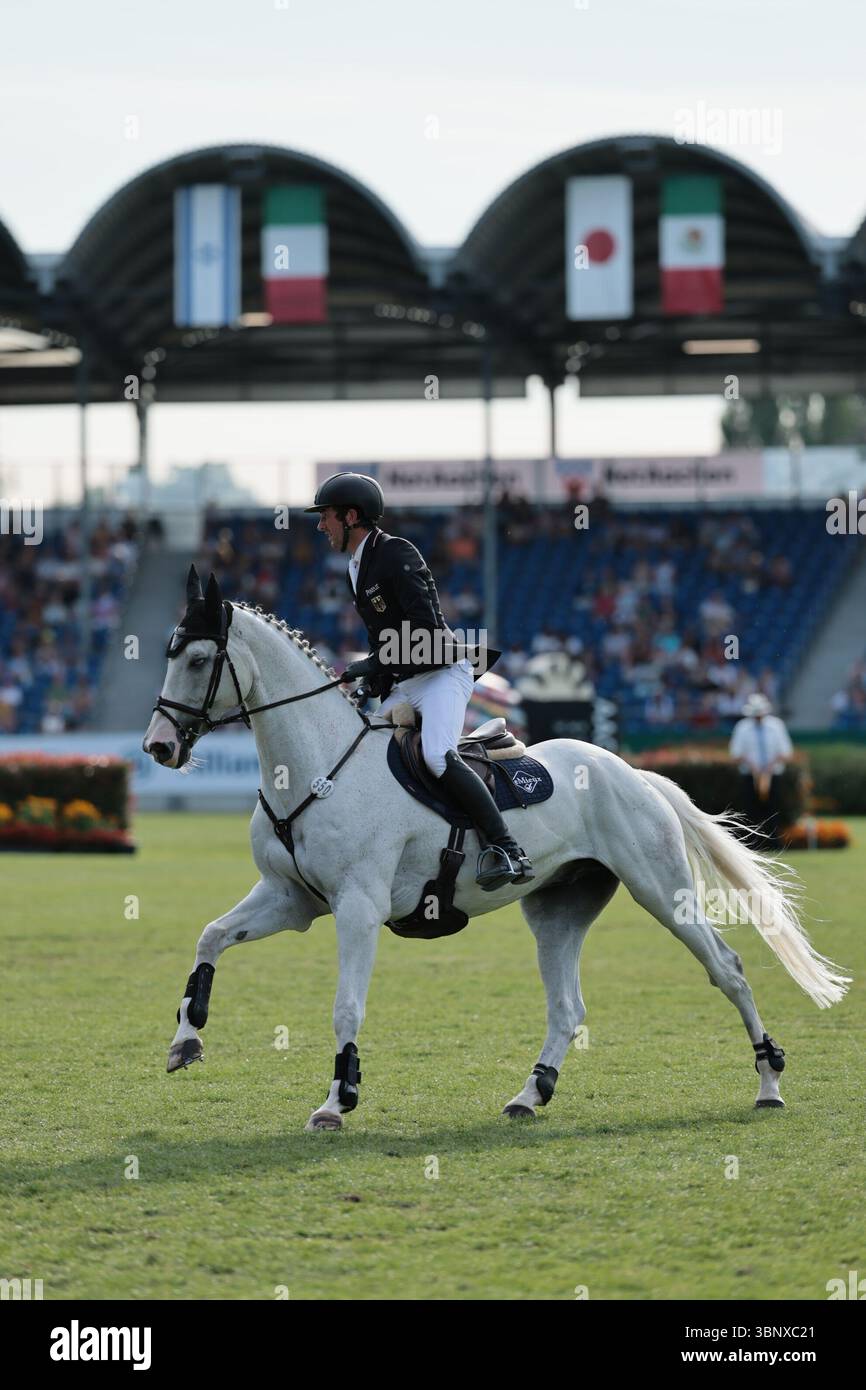 Nicolai Aldinger of Germany with Timmo during the showjumping of the ...