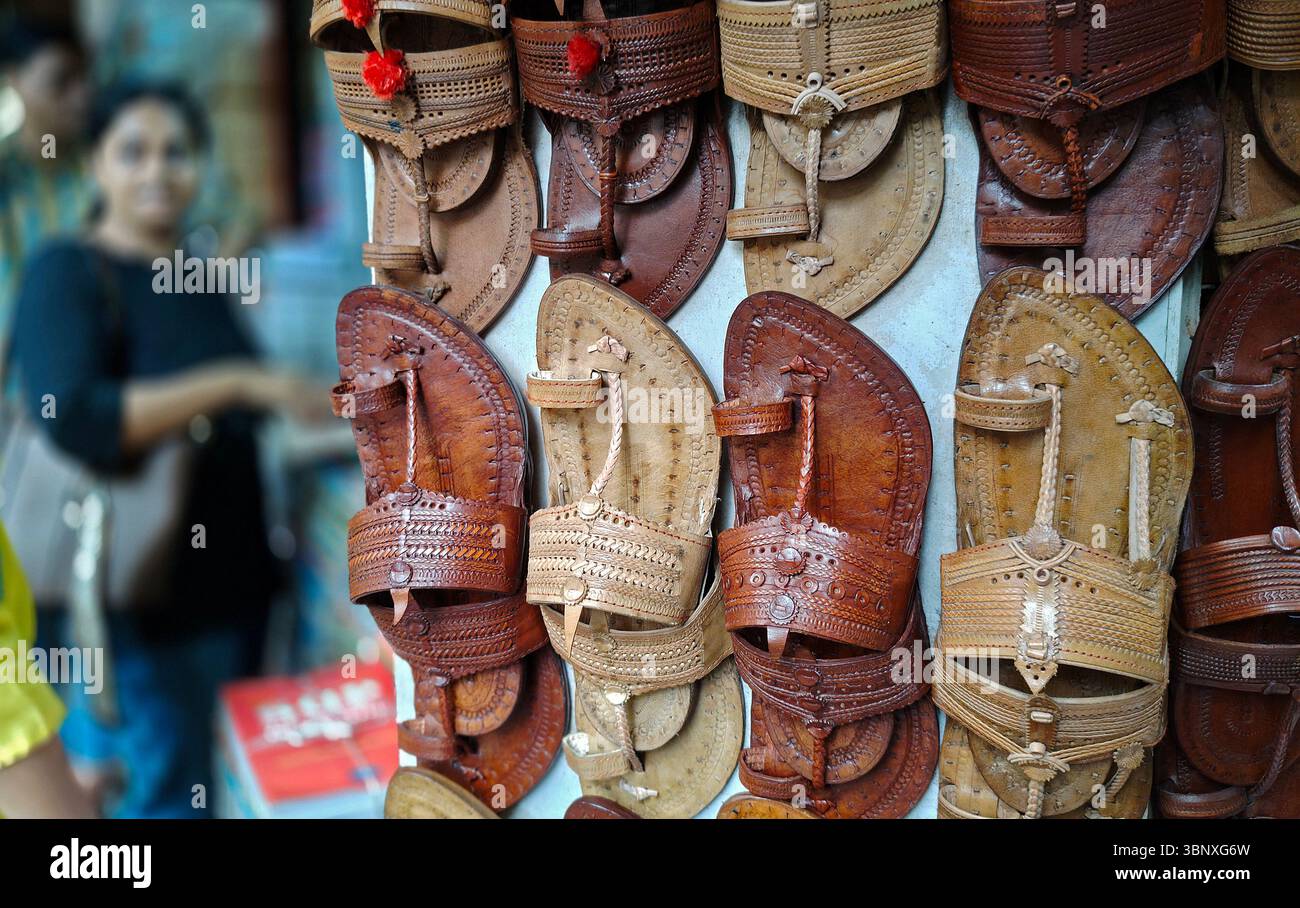 Pairs of kolhapuri chappals hi-res stock photography and images - Alamy